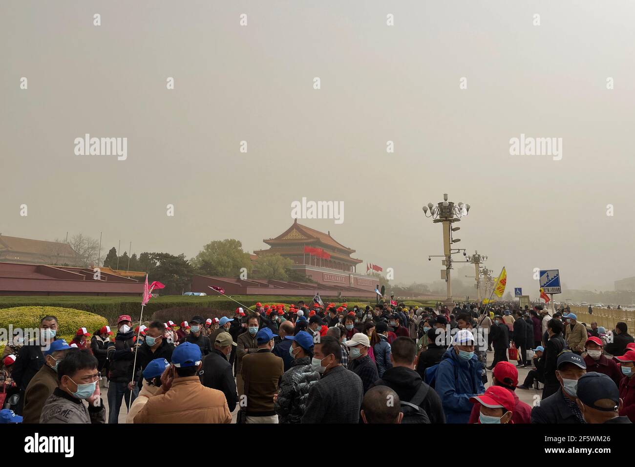 Beijing, China. 28th Mar, 2021. People visit Tiananmen scenic spot in ...