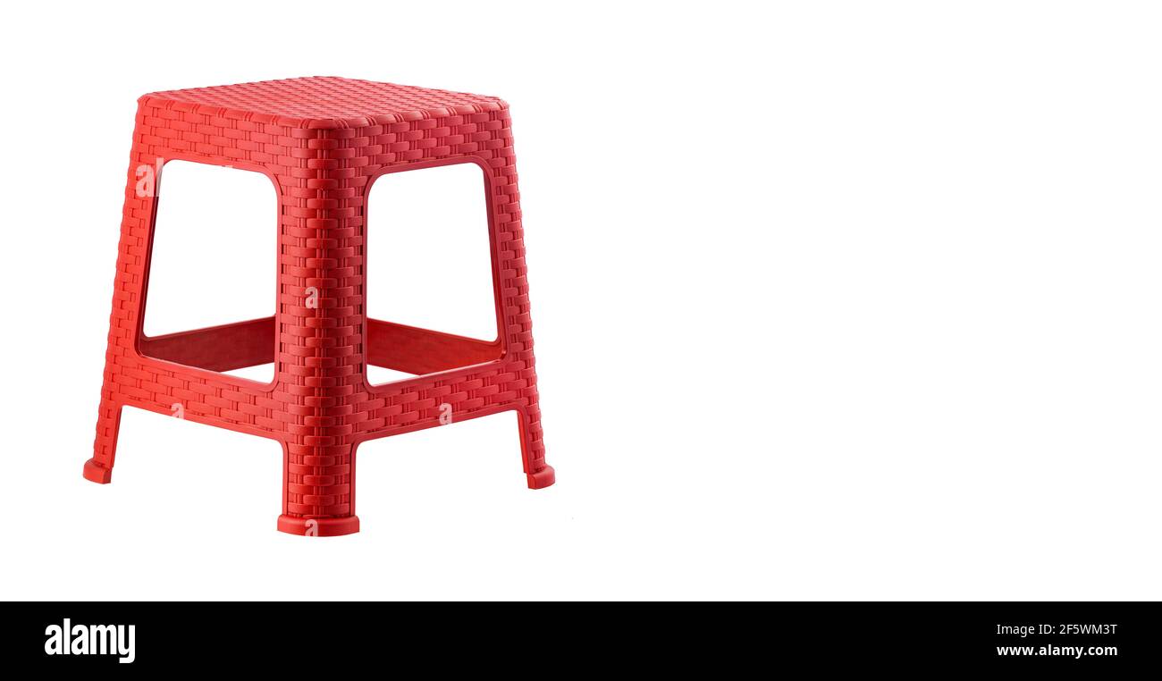 Red plastic chair isolated on white background Stock Photo - Alamy