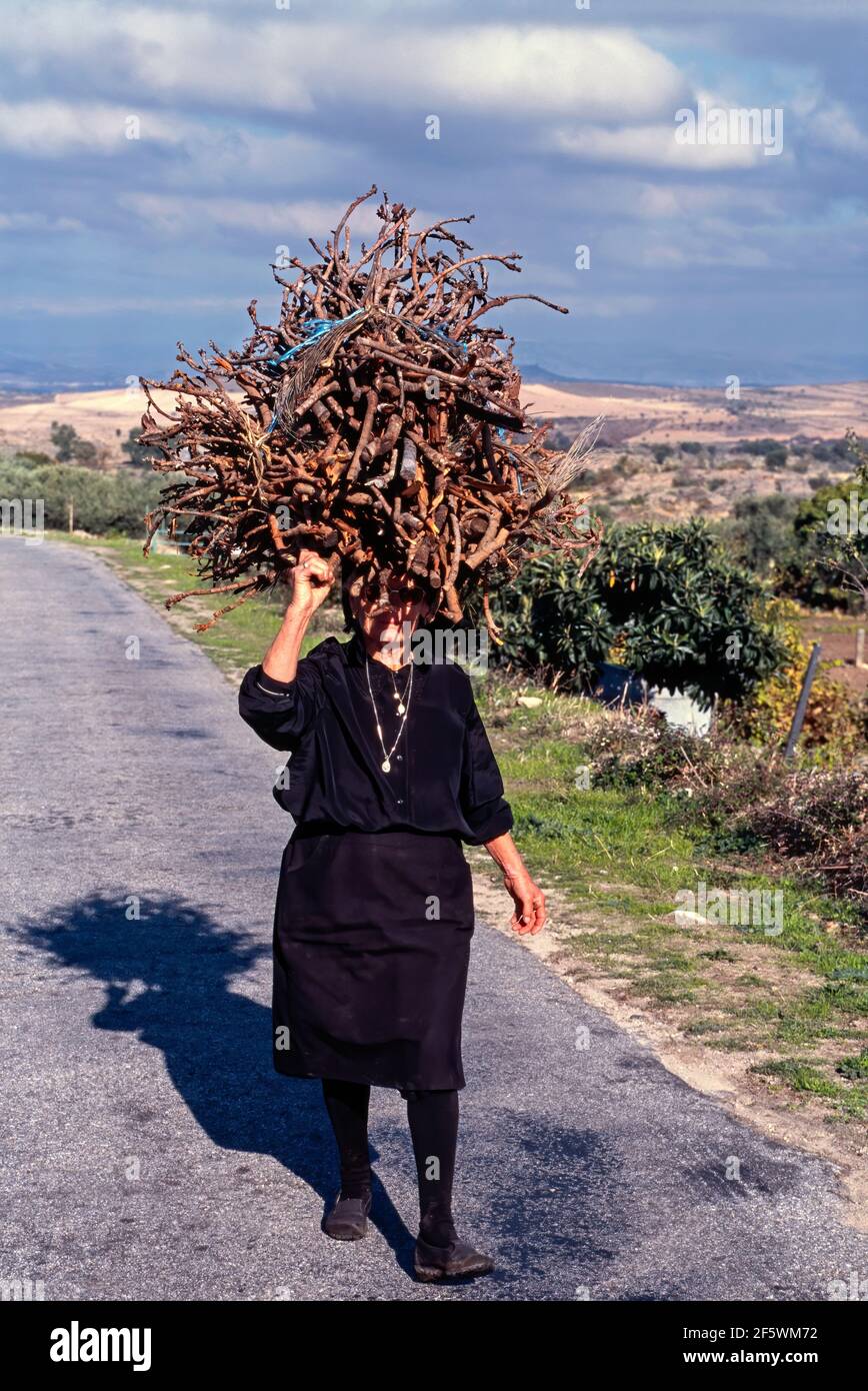 Old Woman Carrying Wood High Resolution Stock Photography and Images ...