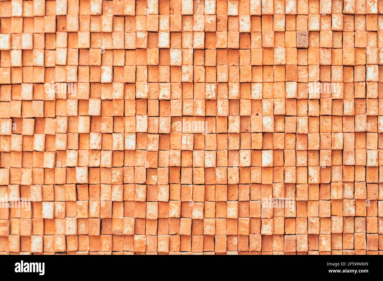 Rectangular orange bricks random pattern wall facade texture material ...