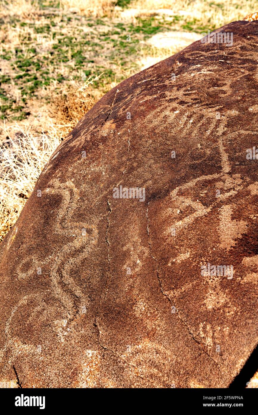 Artwork form native American Indians carved into a rock Stock Photo - Alamy