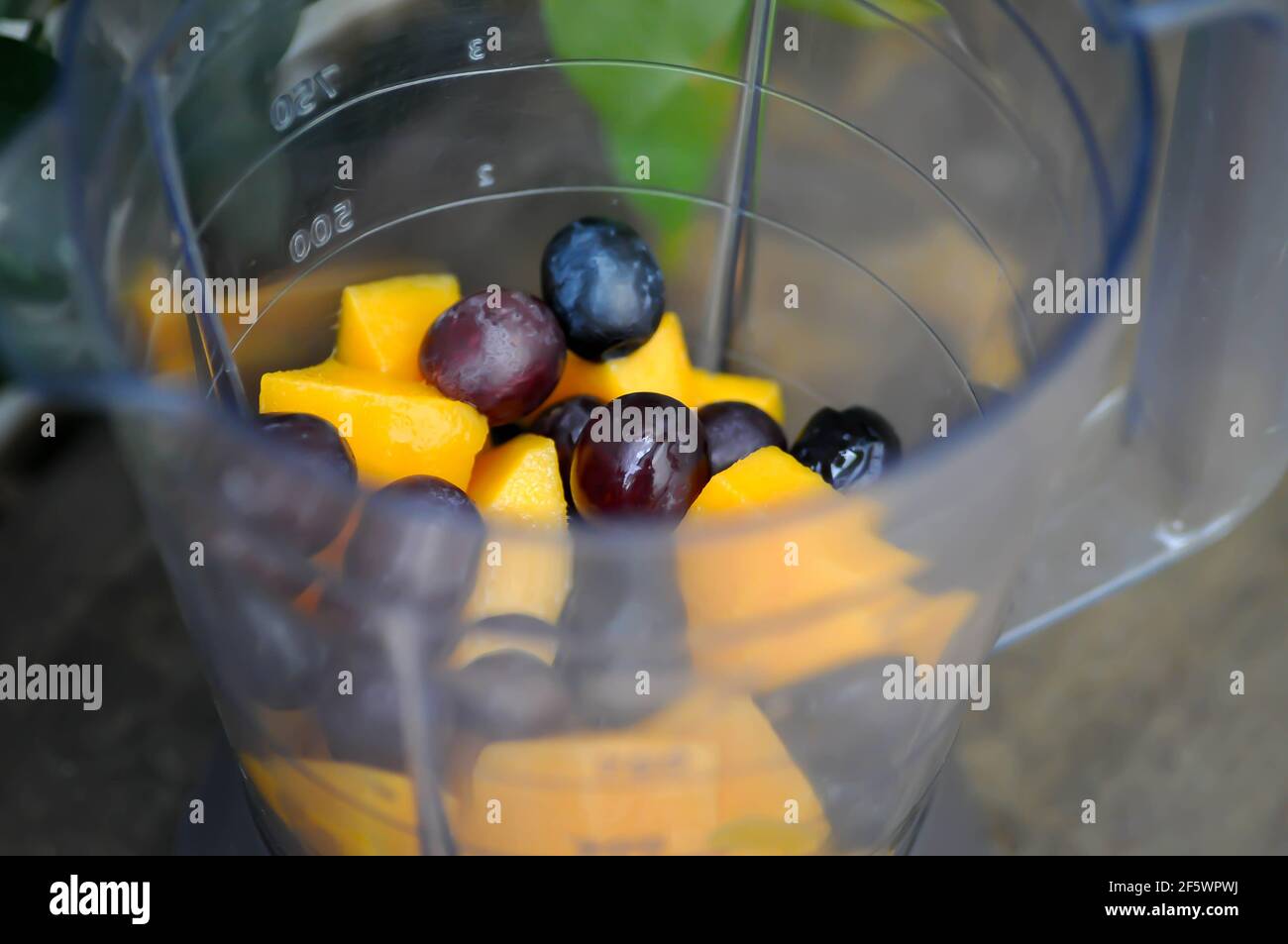 Mango and grape smoothie hi-res stock photography and images - Alamy