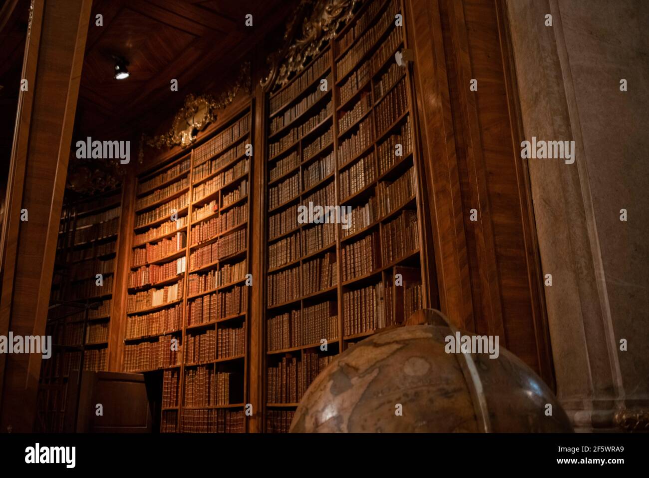 October 5, 2019 Vienna, Austria. Old large library with many shelves ...
