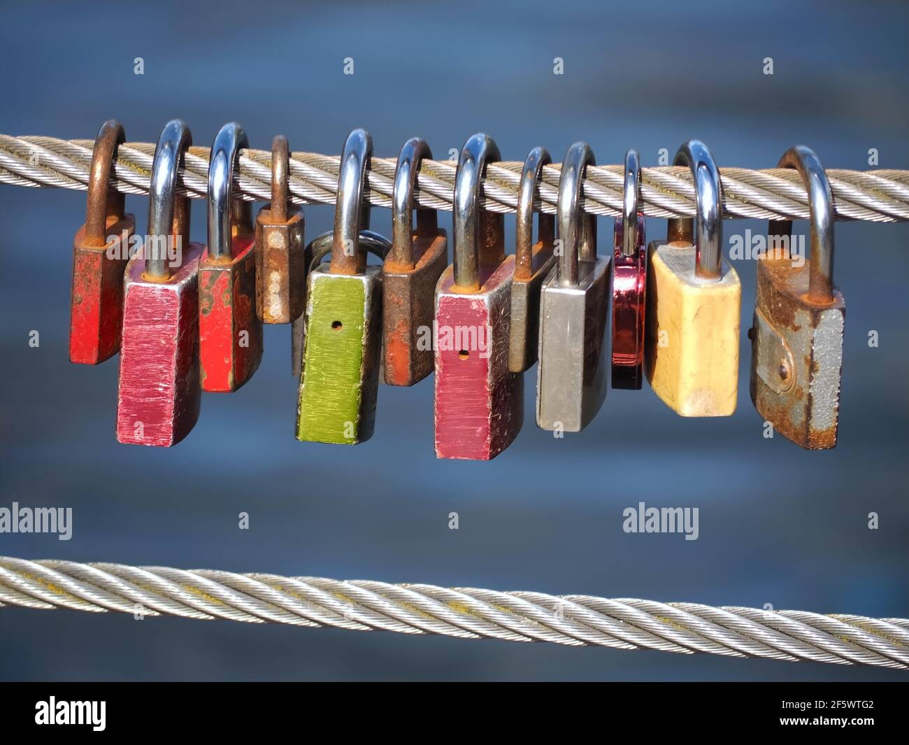 Macro of many love locks at a fence Stock Photo - Alamy