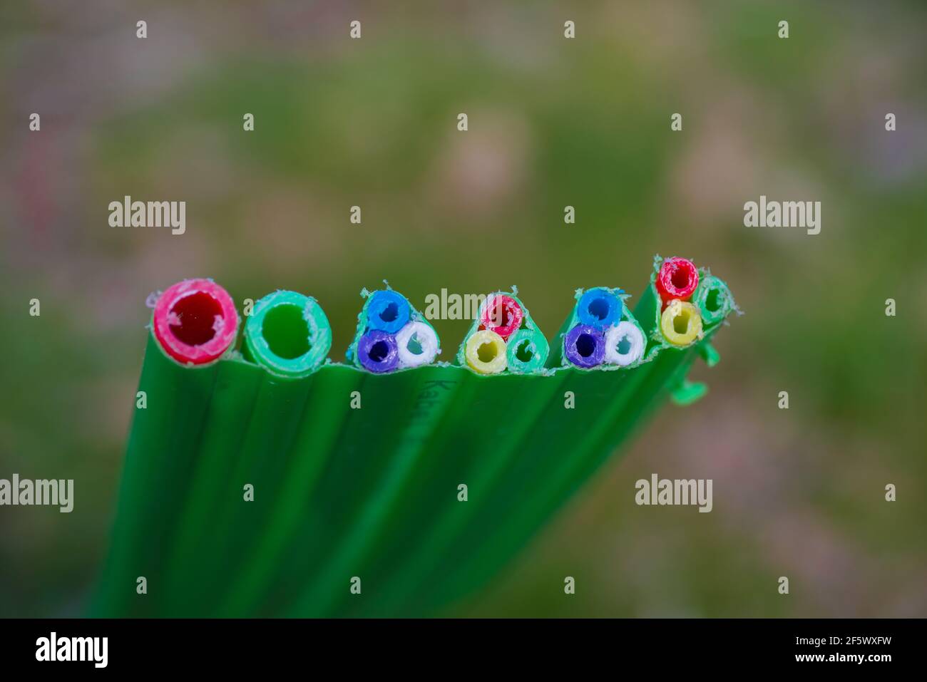 colorful tubes for fiber optic cable Stock Photo - Alamy