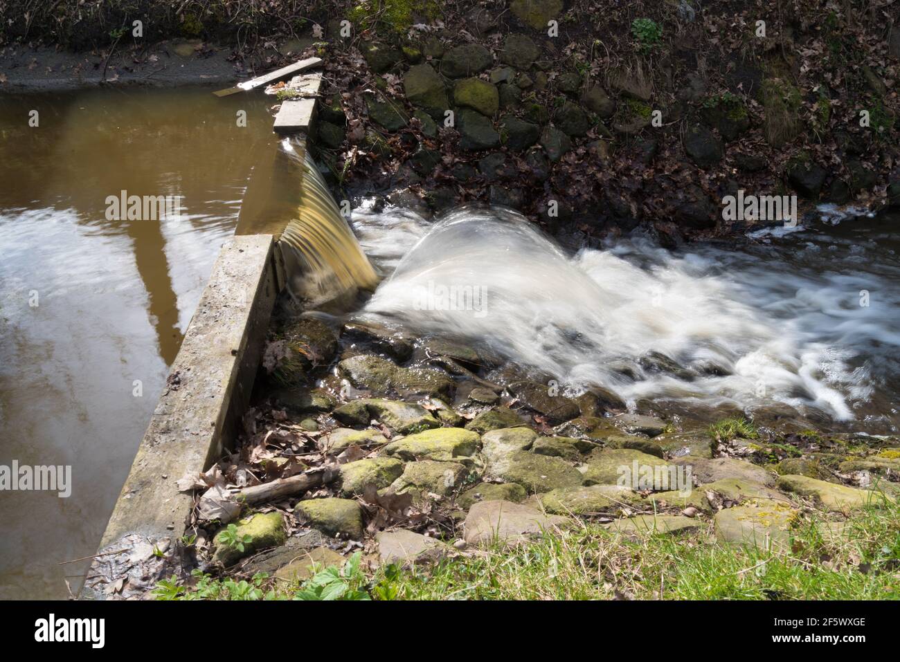 small weir in a ditch Stock Photo - Alamy