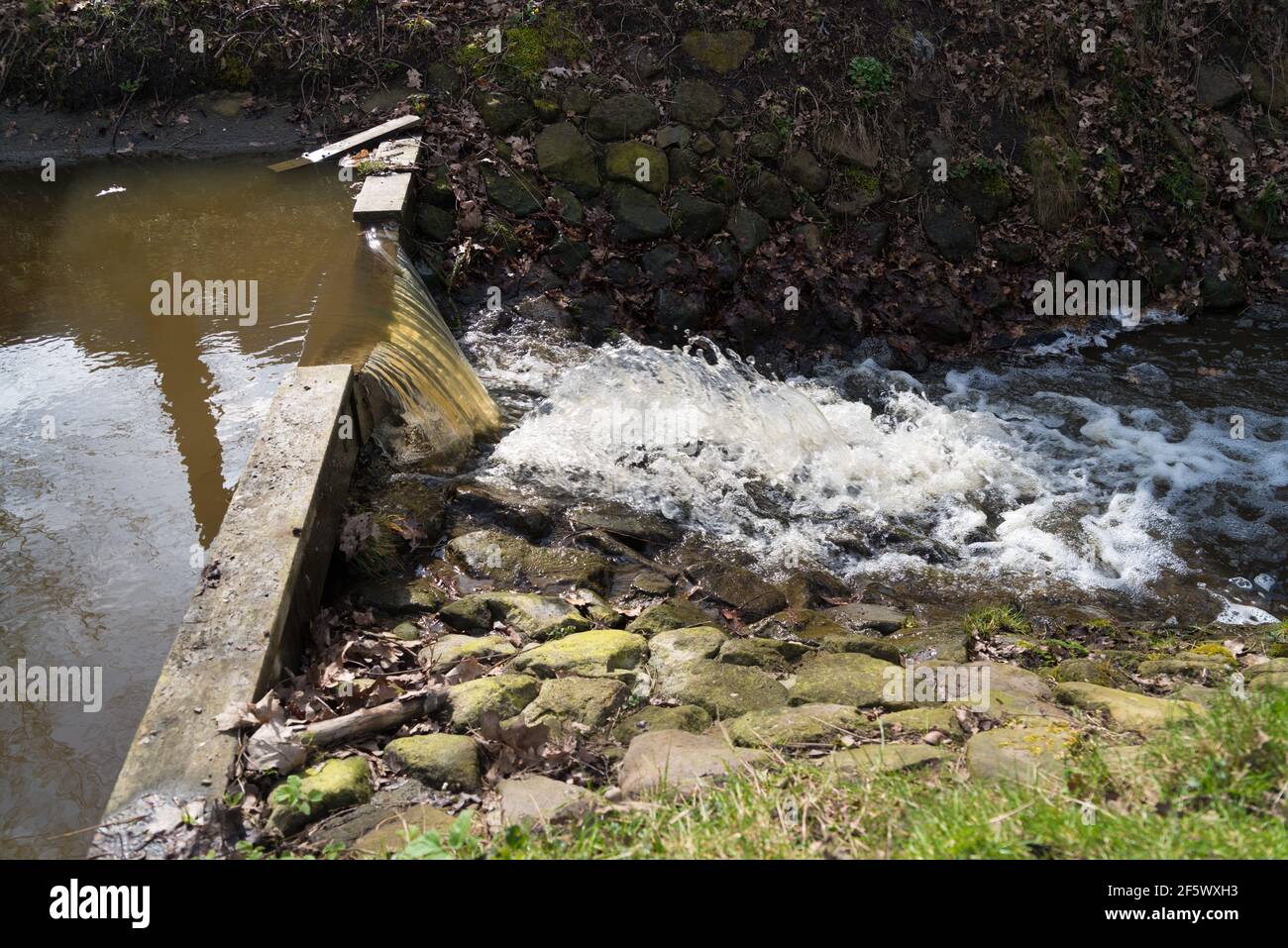 small weir in a ditch Stock Photo - Alamy