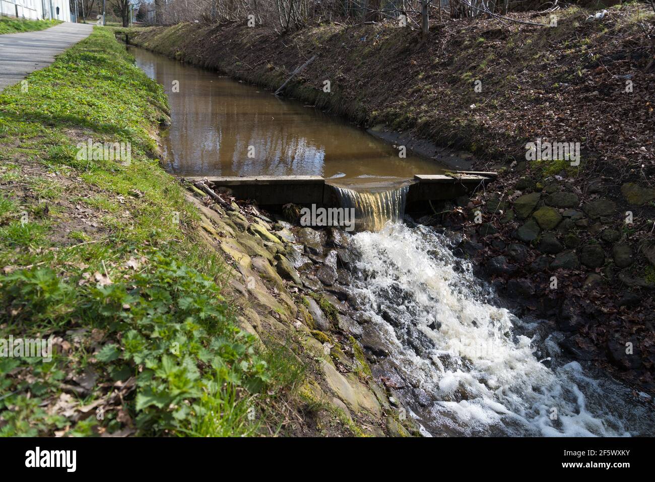 small weir in a ditch Stock Photo - Alamy