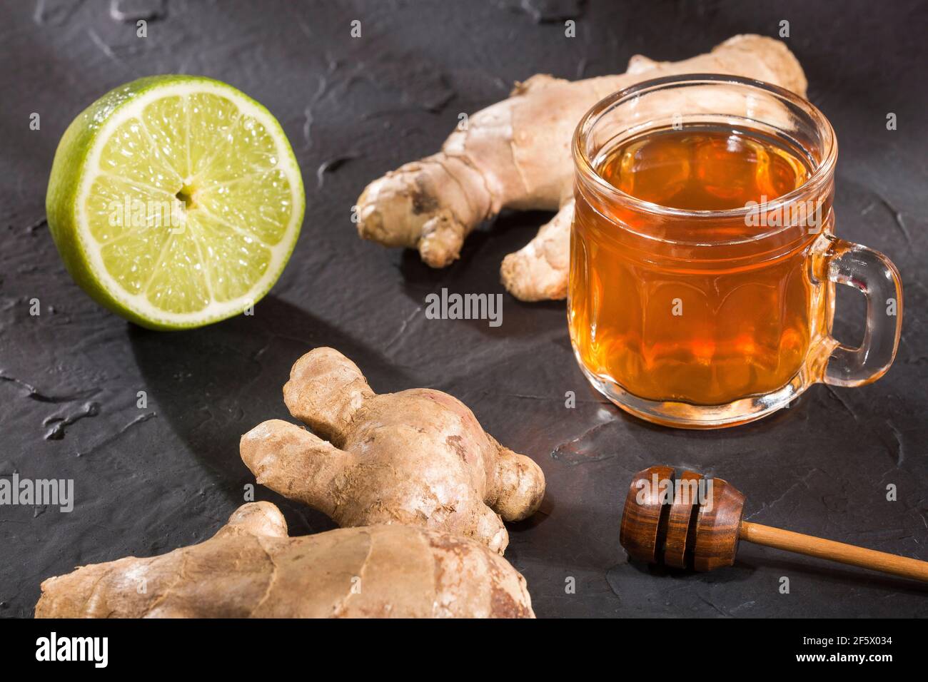 Ginger root tea with lime and honey - Zingiber officinale Stock Photo ...