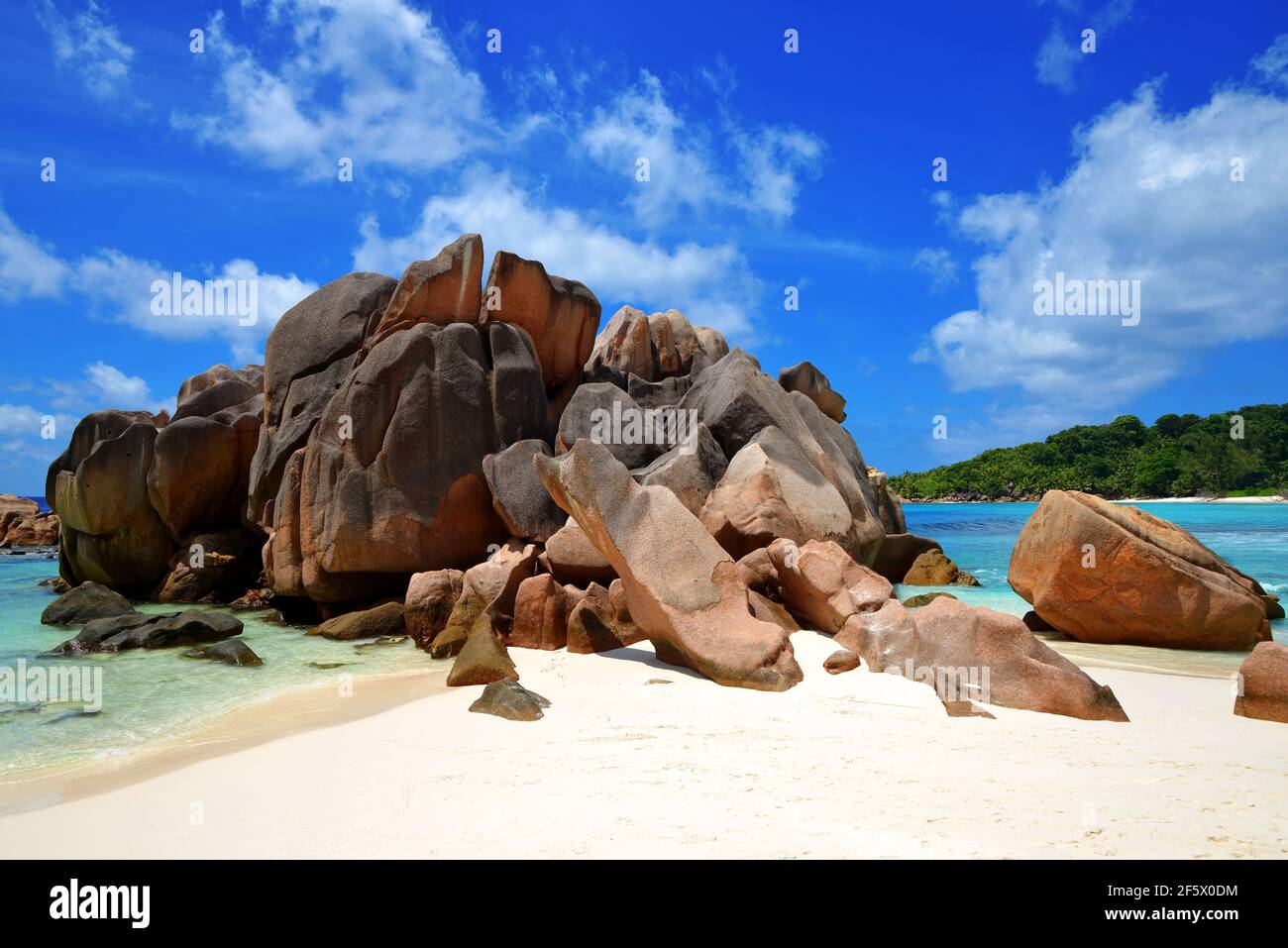 Anse Cocos beach with big granite stones in La Digue Island, Indian ...