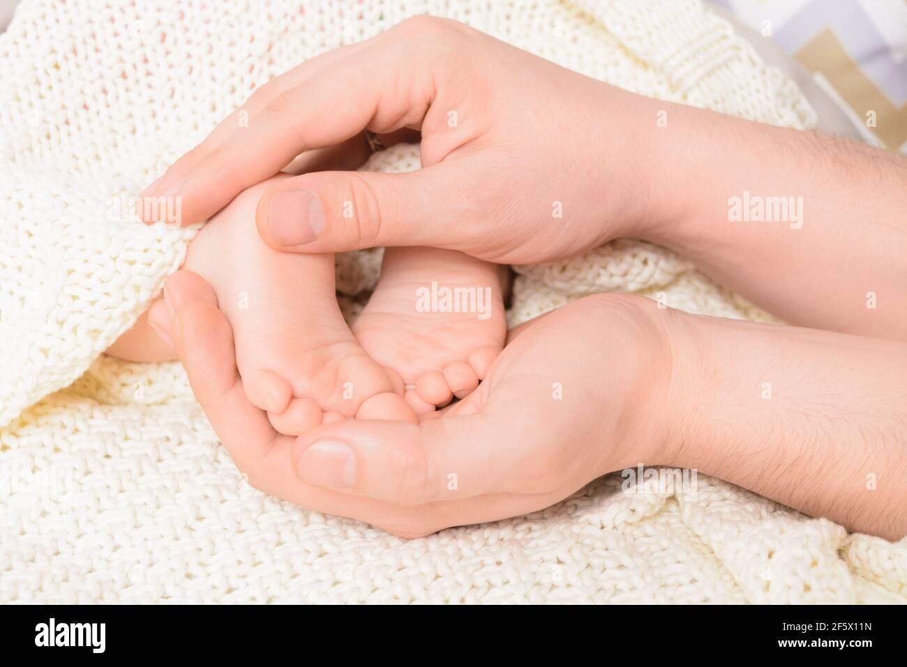 Male child feet hi-res stock photography and images - Alamy