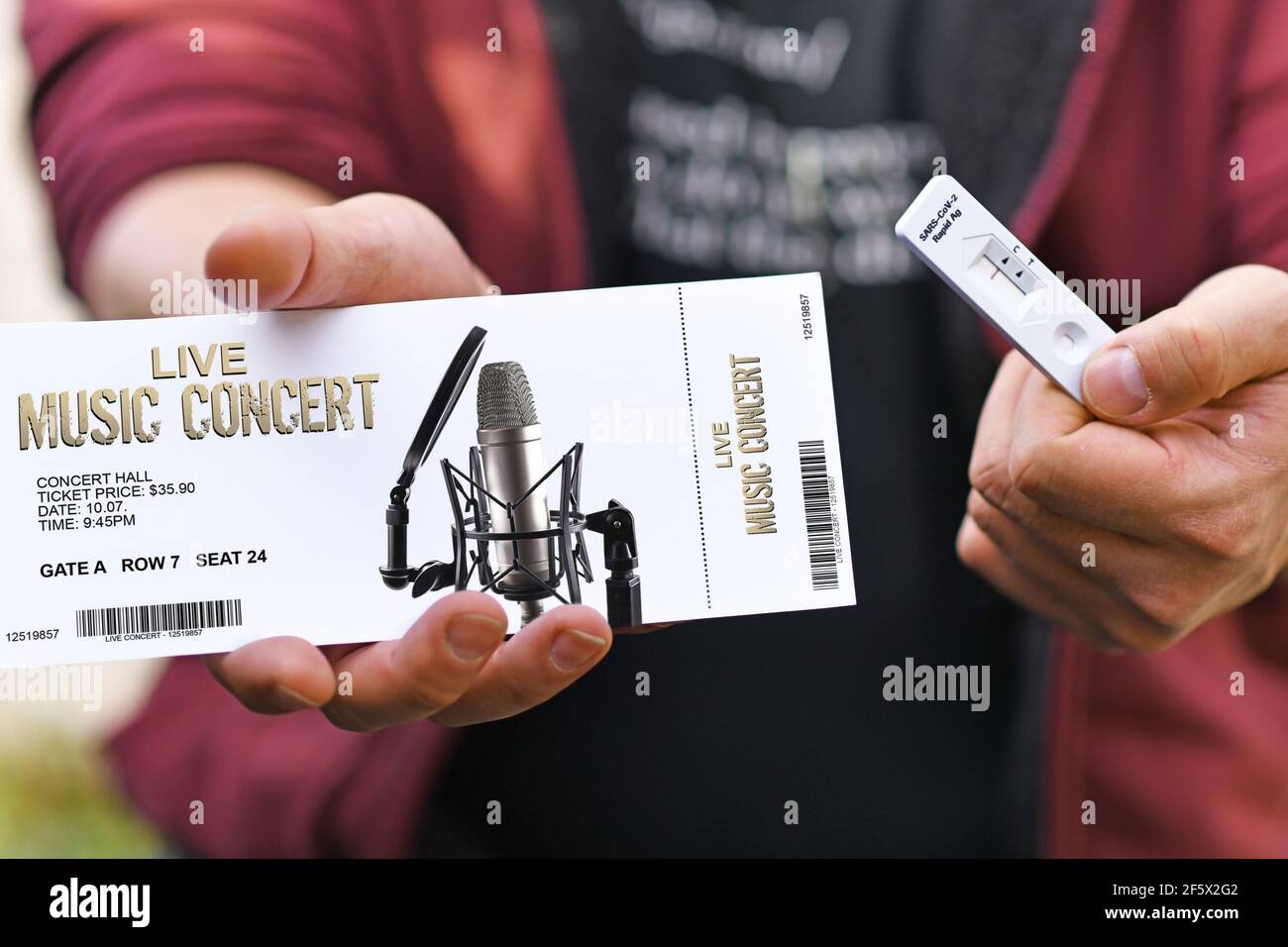 Concept for attending concerts during Corona Virus pandemic with hand ...