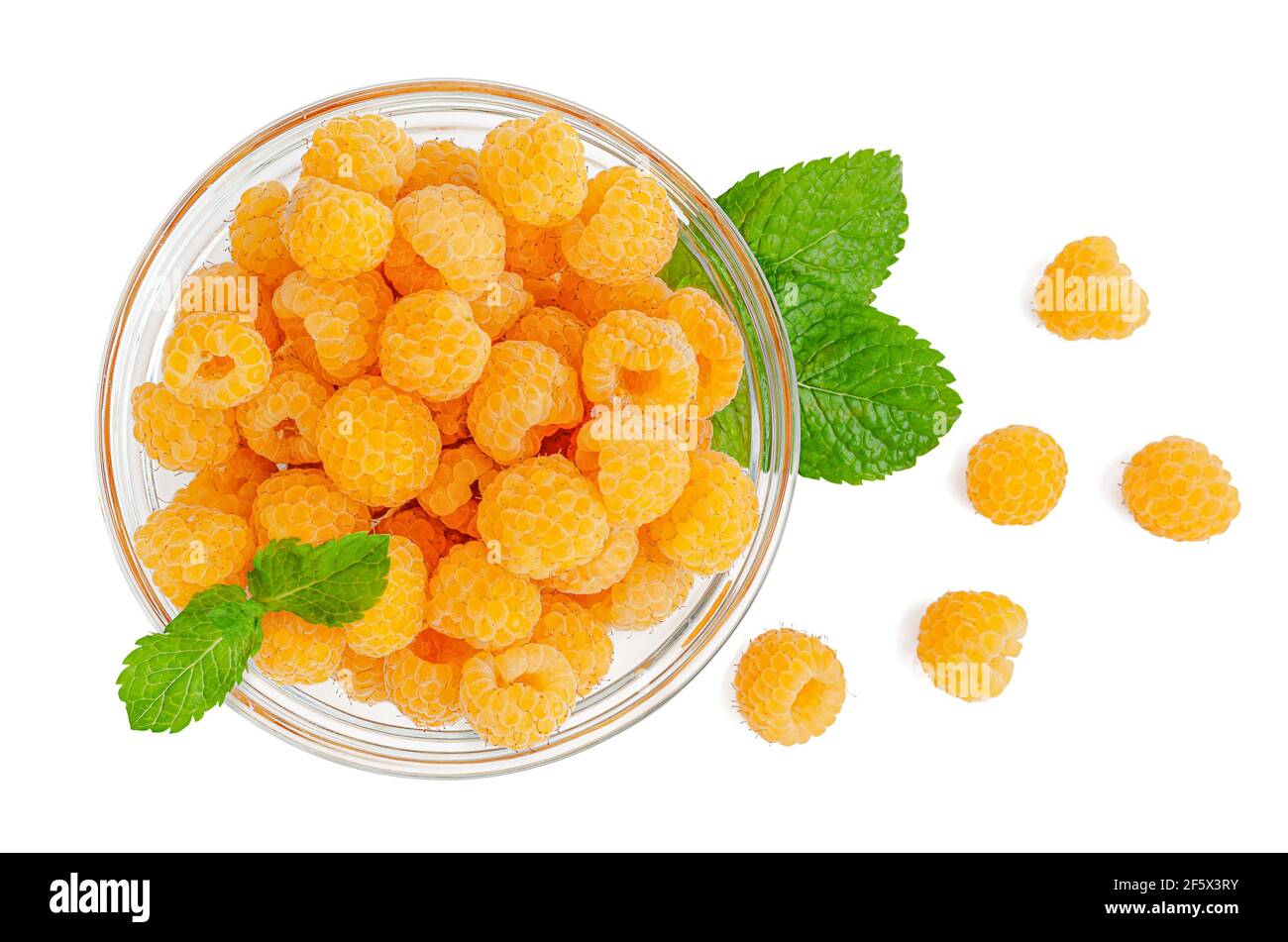 Yellow raspberries in transparent bowl on white background isolated ...