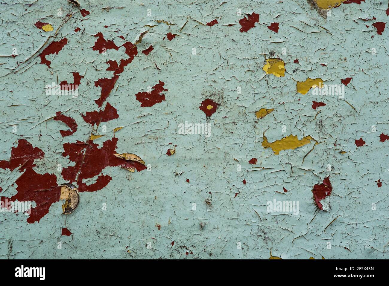layers of paint peeling and flaking off an old piece of wood Stock ...