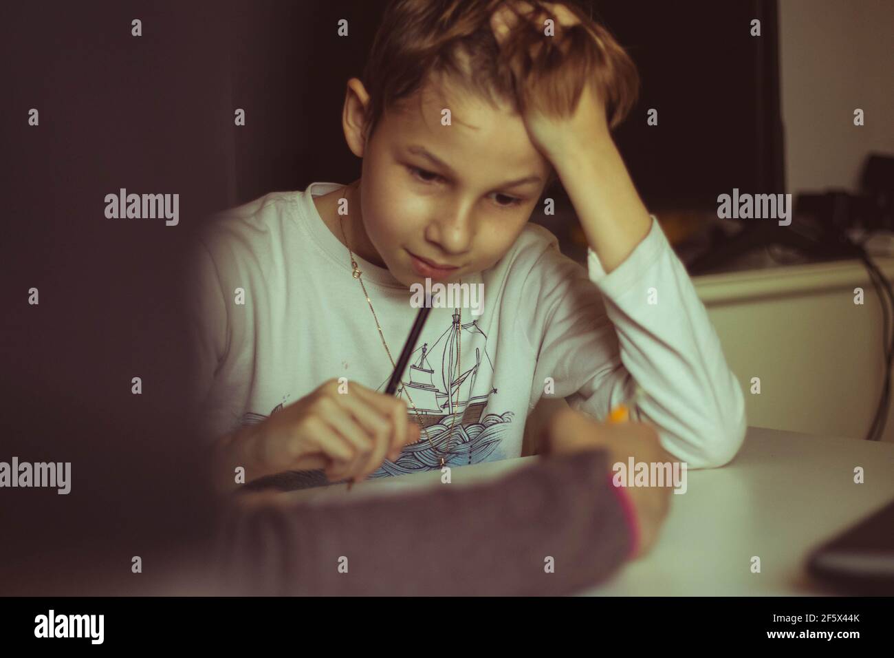 Child doing homework in Italy 2021 Stock Photo - Alamy
