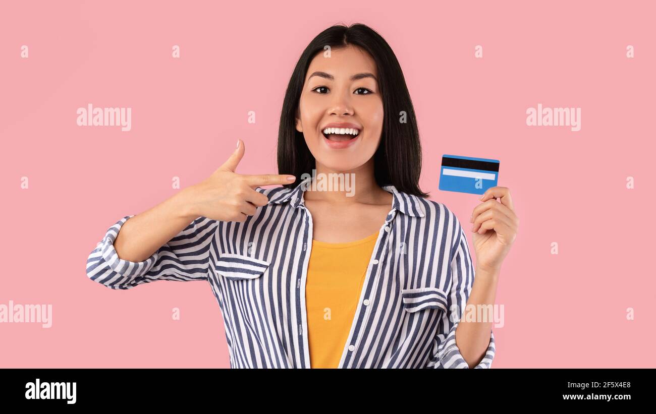 Asian female customer pointing hi-res stock photography and images - Alamy