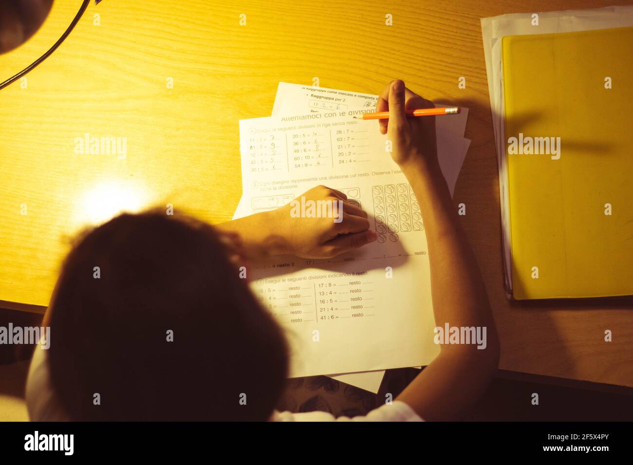 Girl doing homework in italy 2021 Stock Photo - Alamy