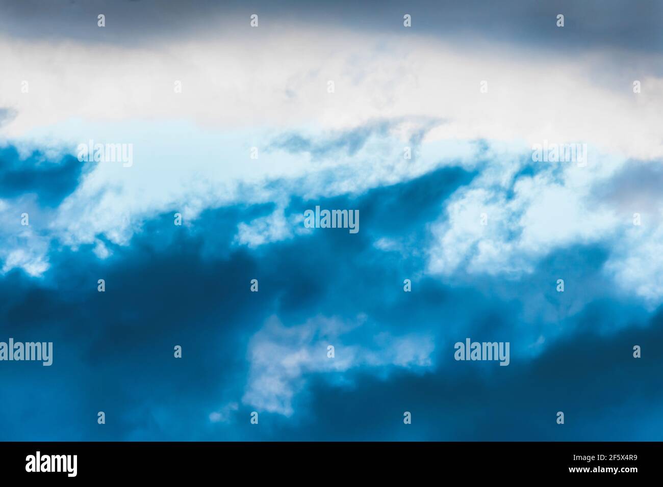 Dark blue rain clouds sky texture background Stock Photo - Alamy