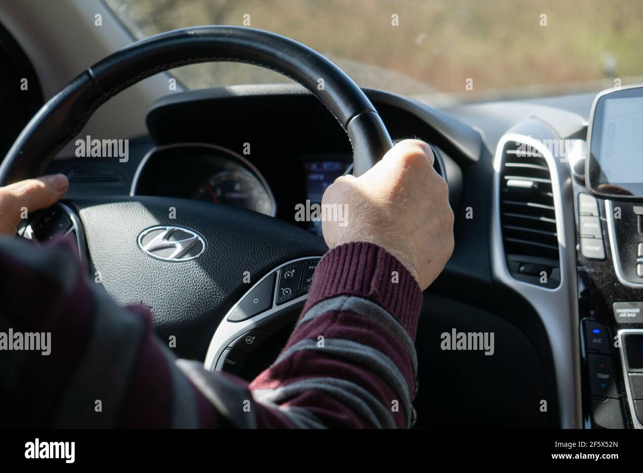 Car interior image and closed up hand of old man drive his car Stock ...