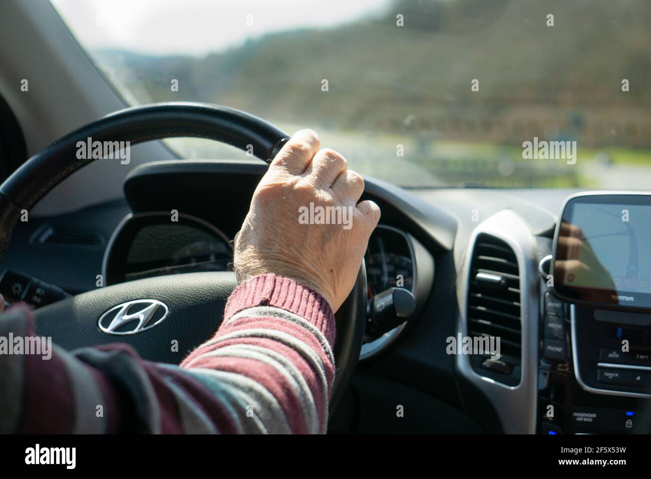 Car interior image and closed up hand of old man drive his car Stock ...