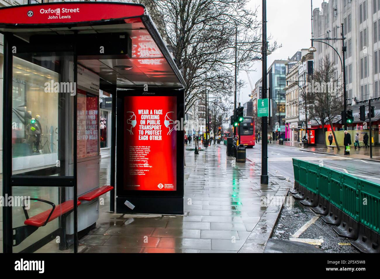 OXFORD STREET, LONDON, ENGLAND- 17th February 2021: Wear a face ...