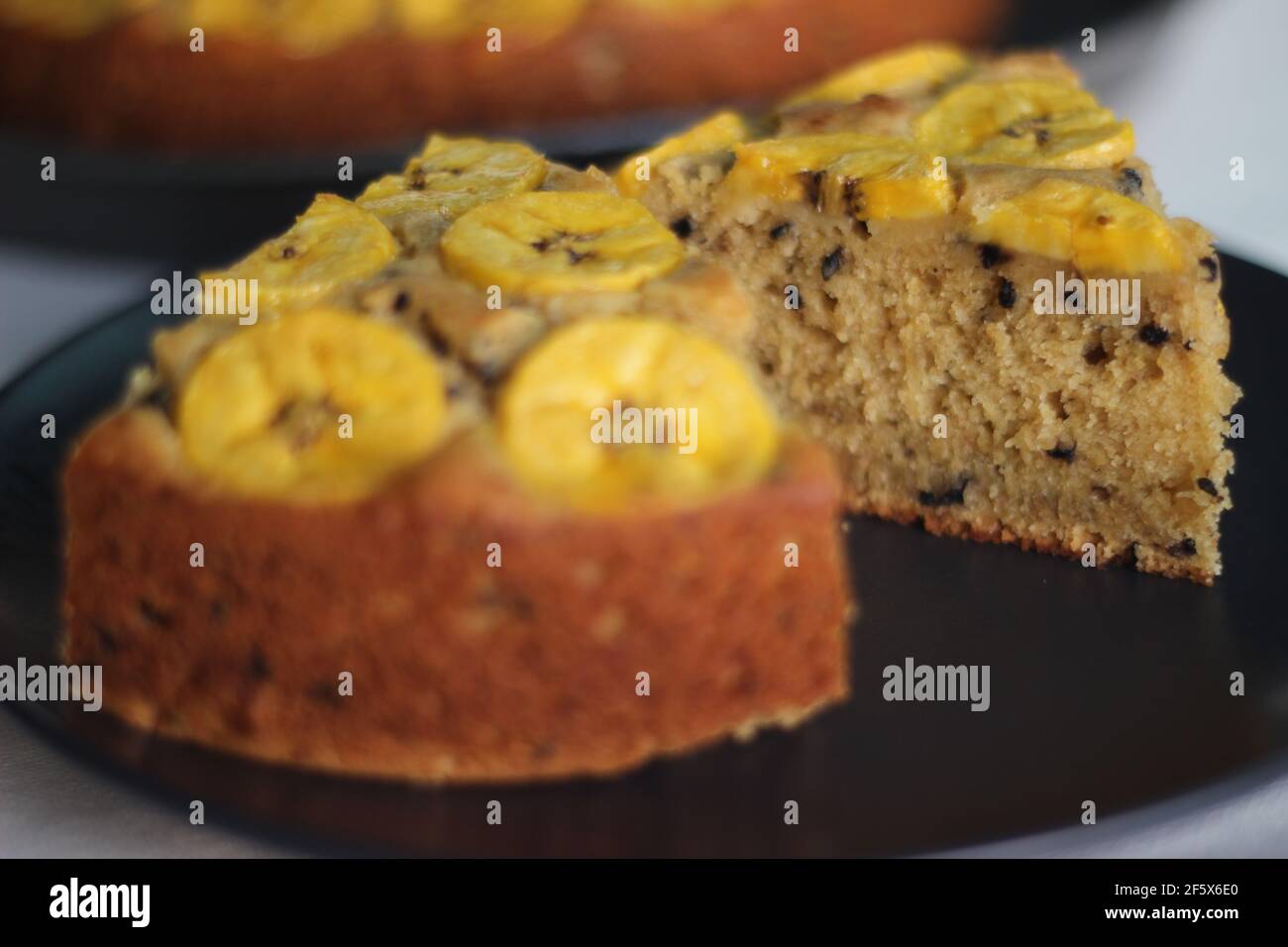 Slices of home baked plantain cake with plantain pieces as a topping ...