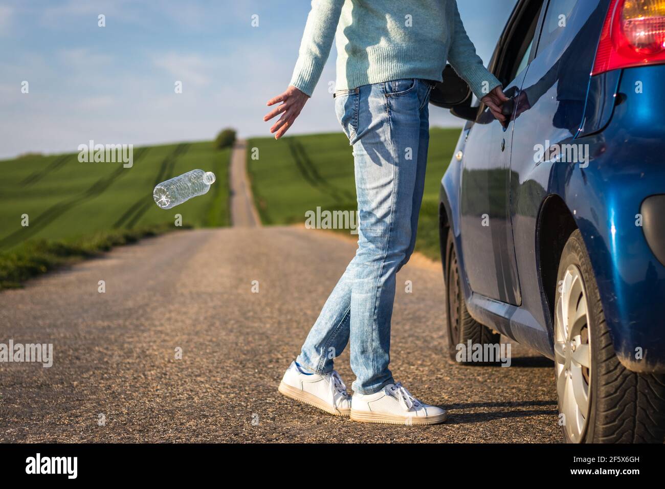 Throwing garbage hi-res stock photography and images - Alamy
