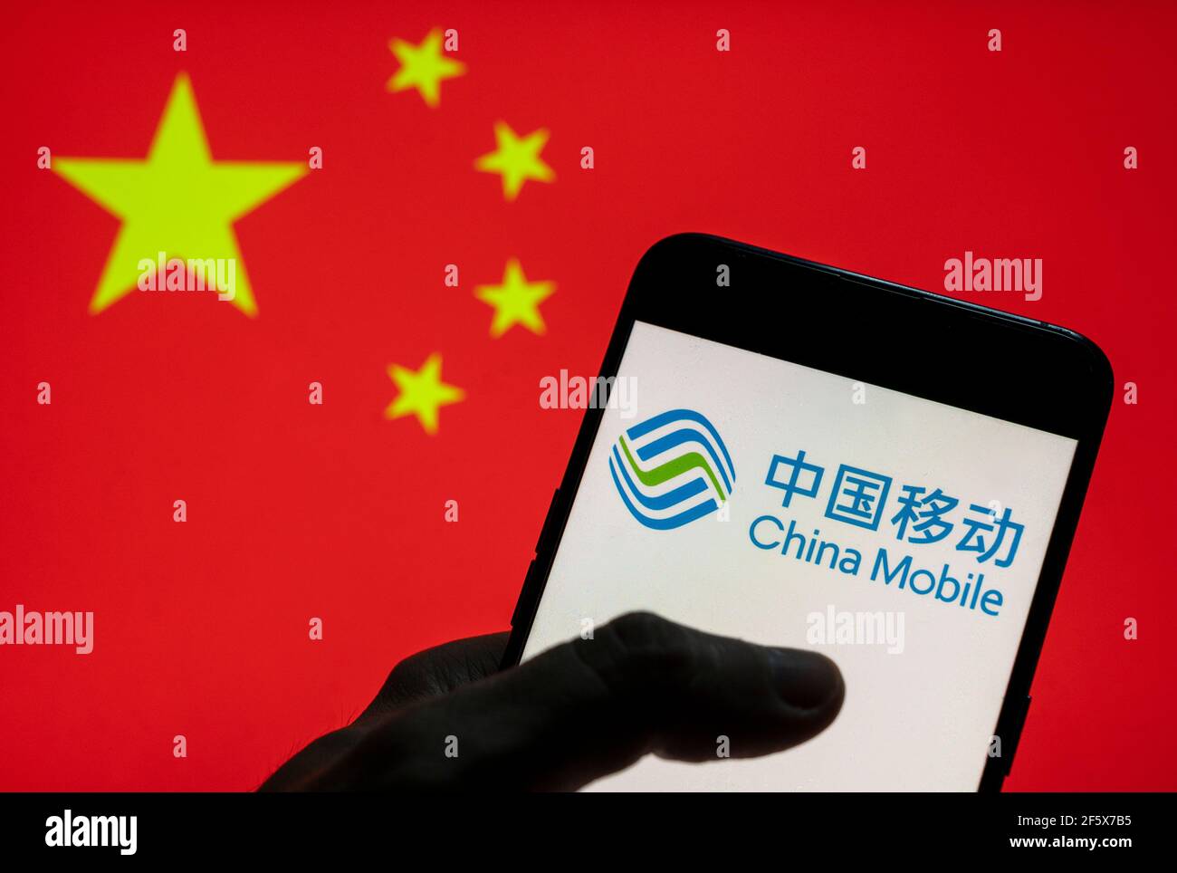 In this photo illustration the Chinese state-owned telecommunication ...