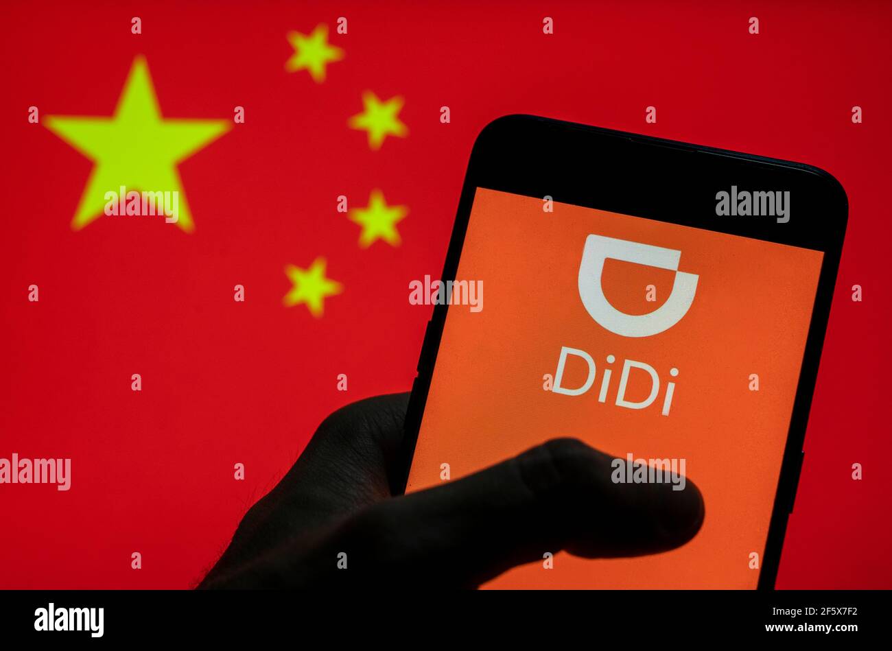 In this photo illustration the Chinese ride-sharing company Didi logo ...