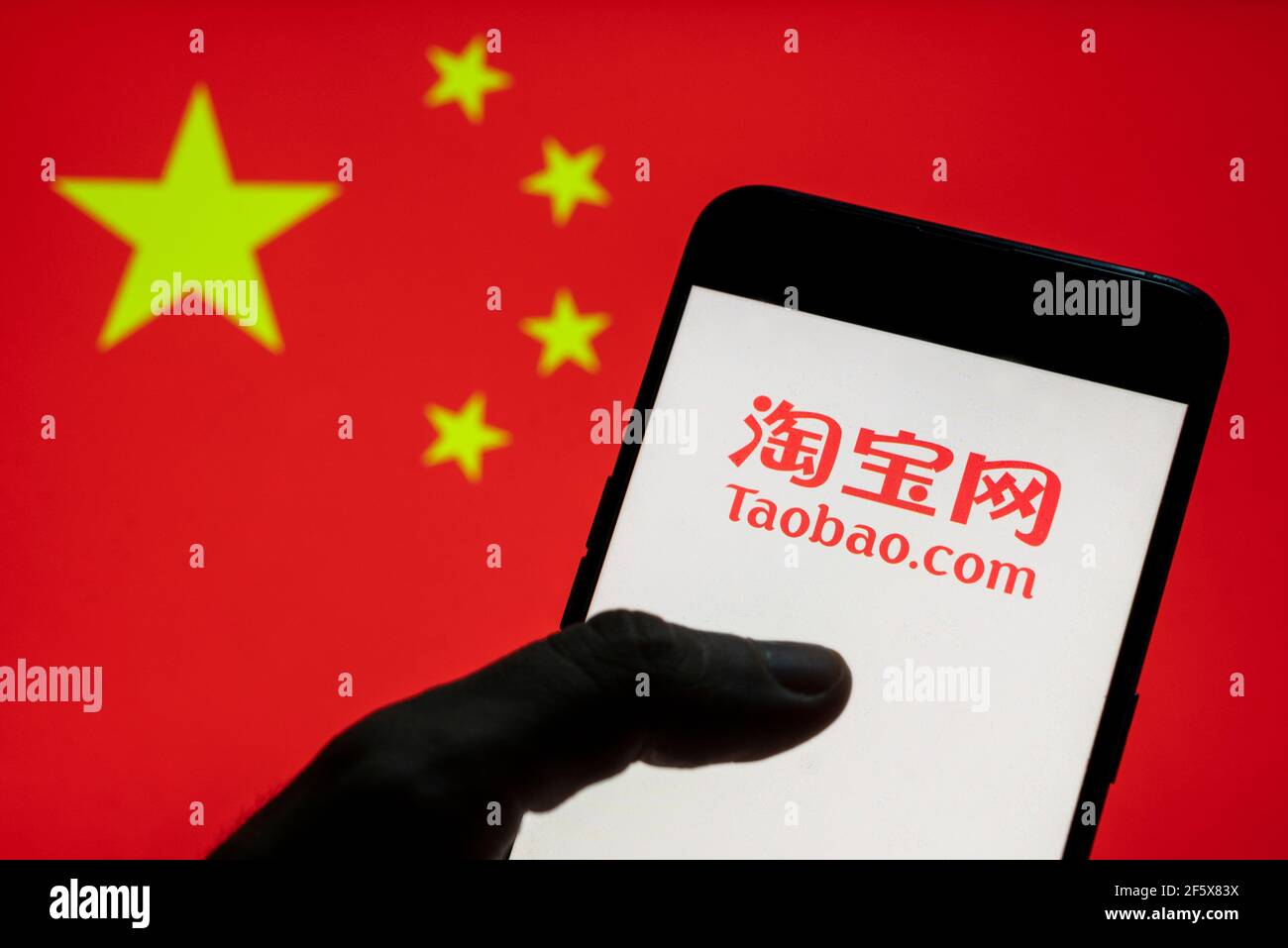 In this photo illustration the Chinese online shopping website owned by ...