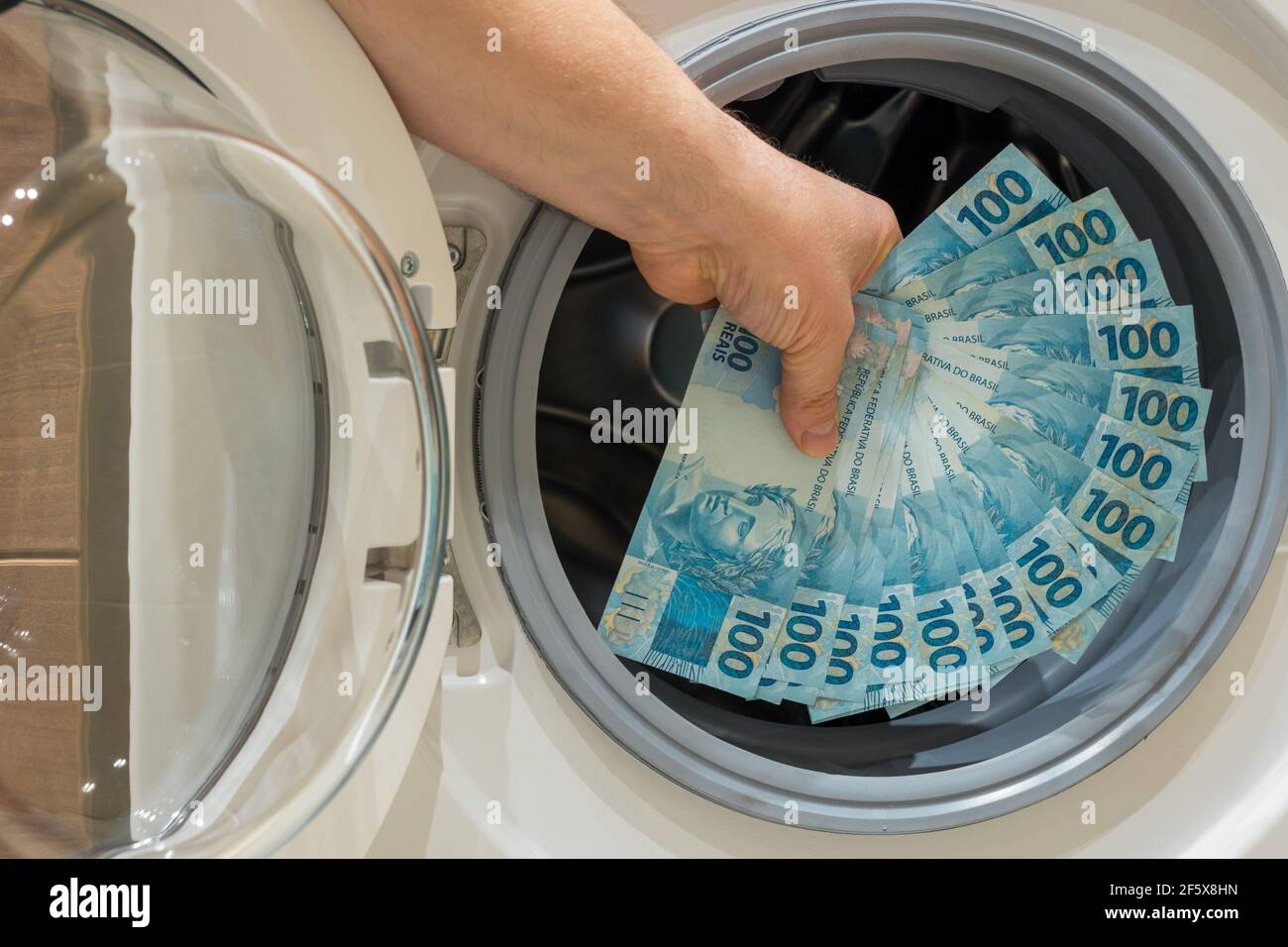 Brazilian money, the concept of money laundering from illegal ...