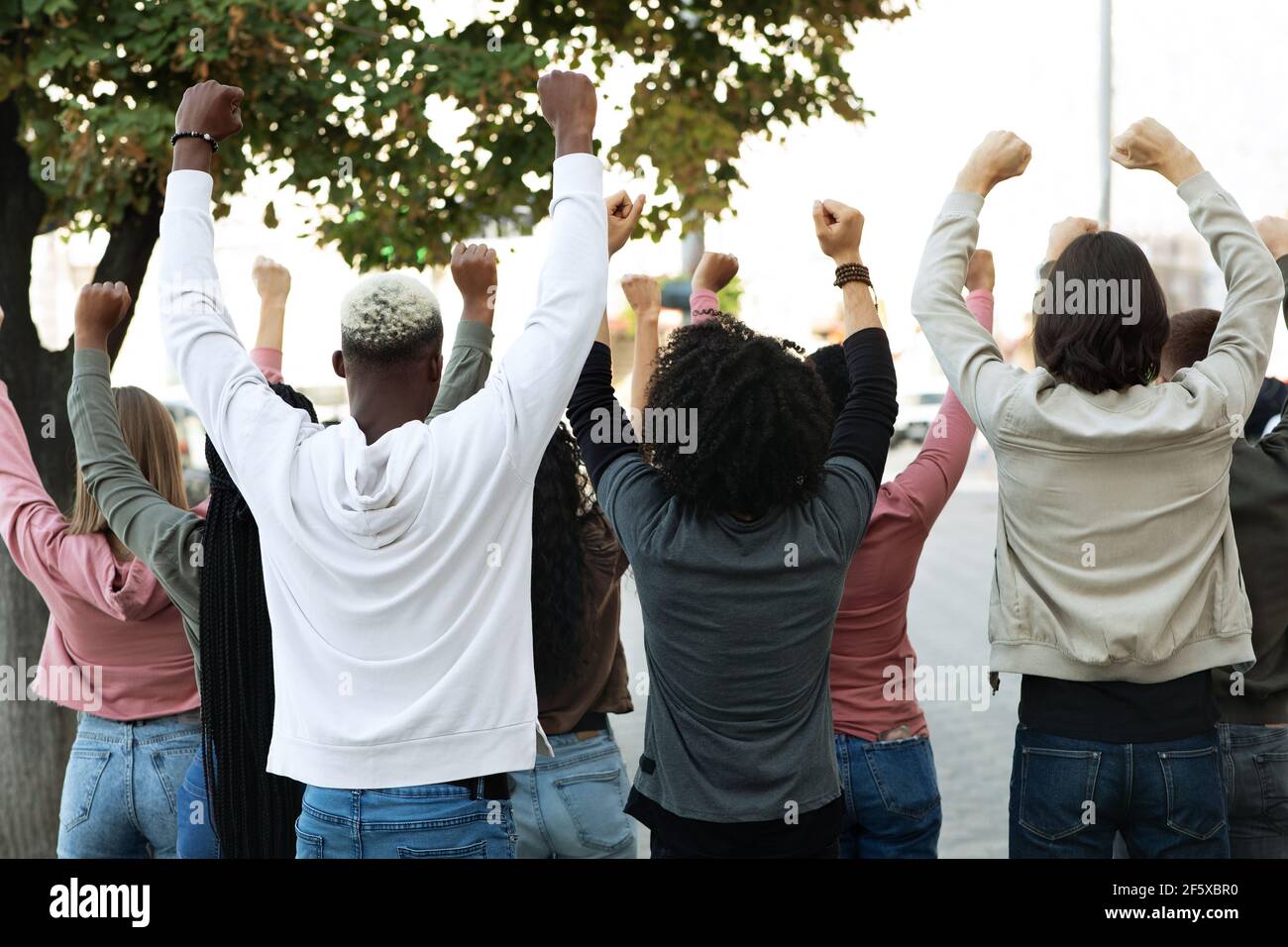 Back view of people making strike on the street Stock Photo - Alamy