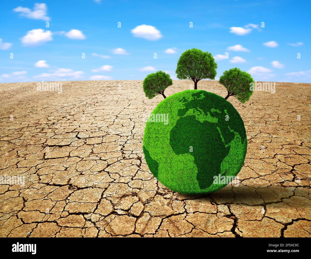 Green planet with trees in the dry landscape with cracked soil. Concept ...