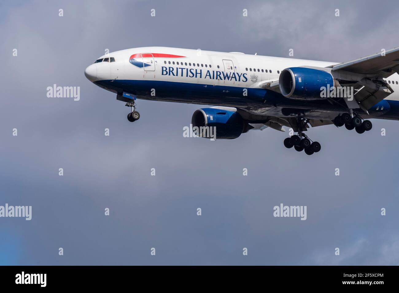 British Airways Boeing 777 jet airliner plane G-YMMA on finals to land ...