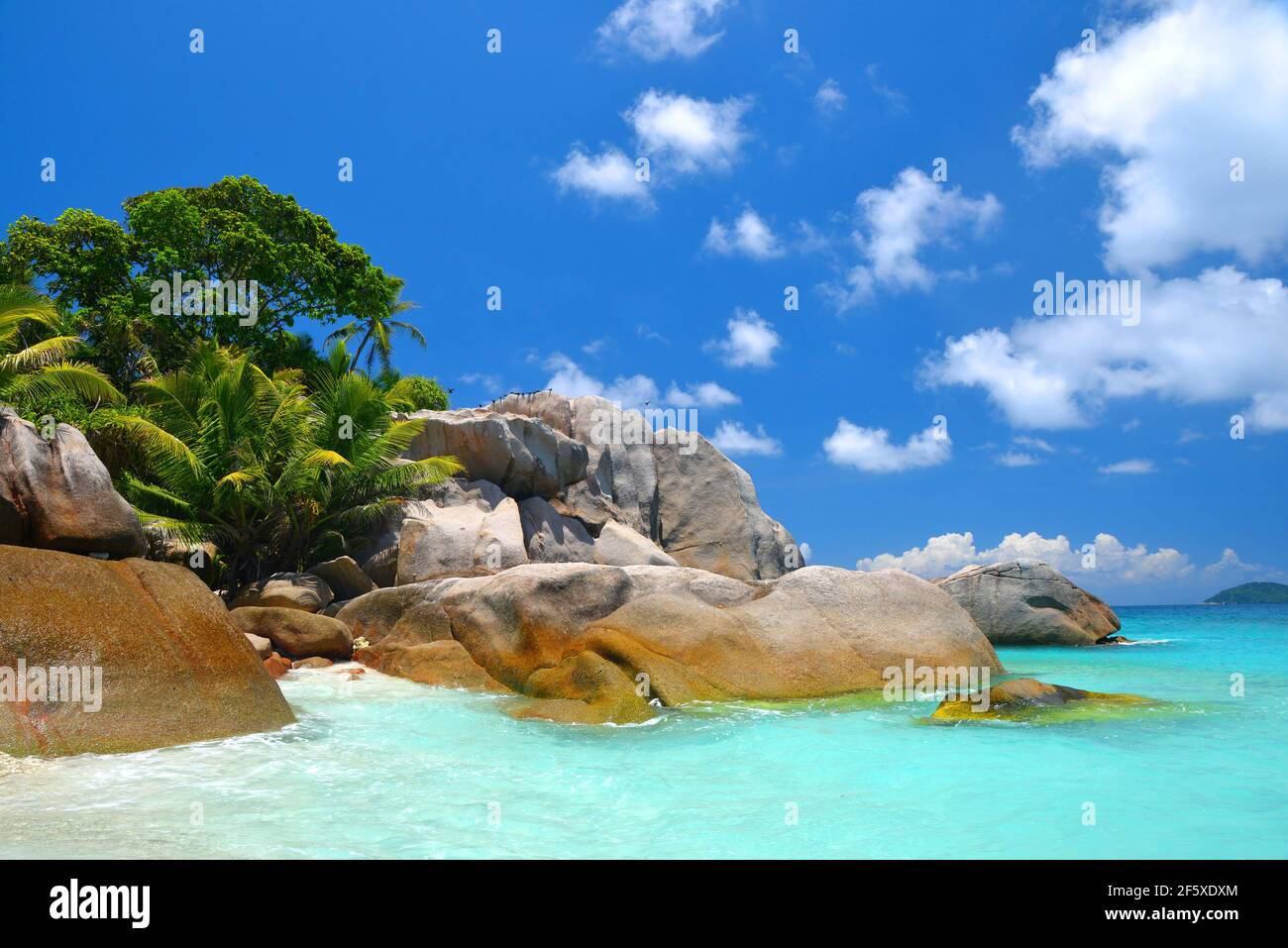 Big granite stones on the tropical beach, Coco Island, Indian ocean ...