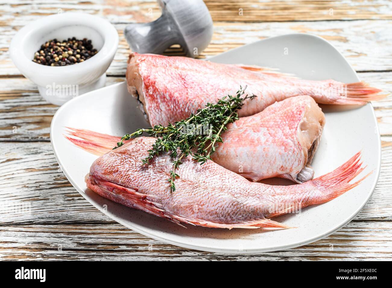 Seabass fish fillet on a plate hi-res stock photography and images - Alamy