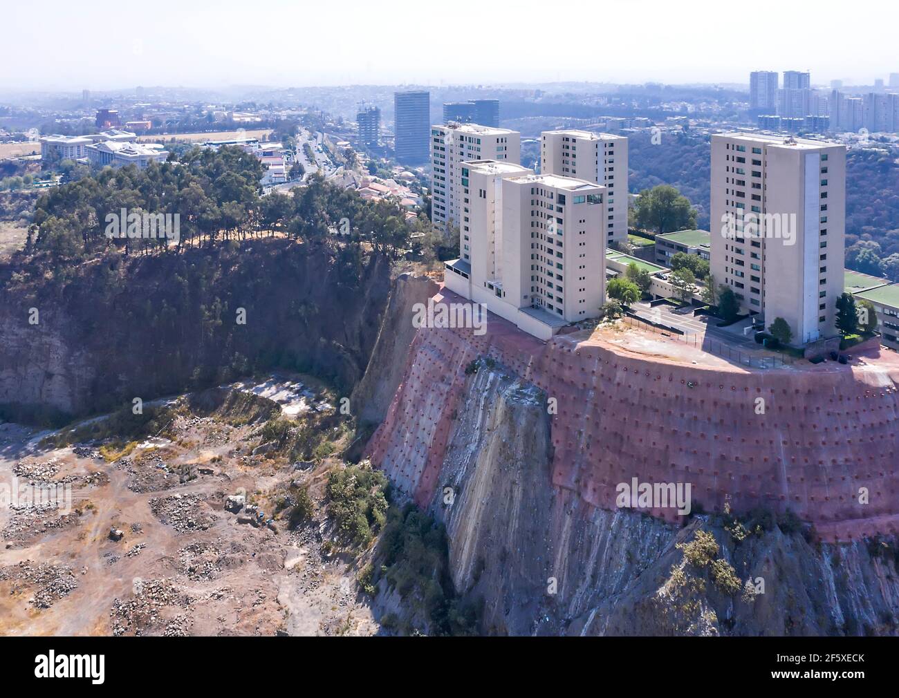 High-rise building erected perilously close to the edge of former ...