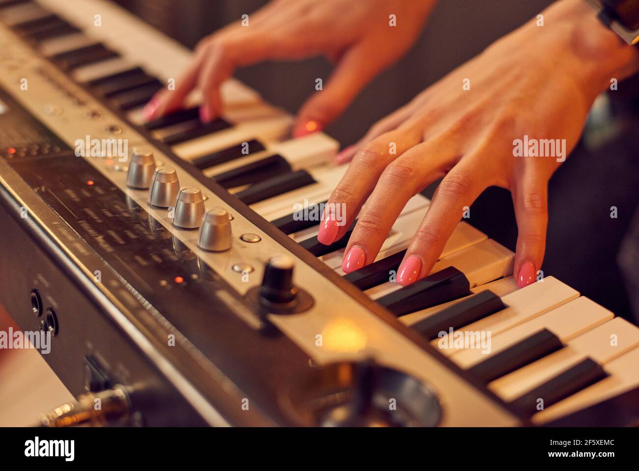 Human hand playing electric piano hi-res stock photography and images ...