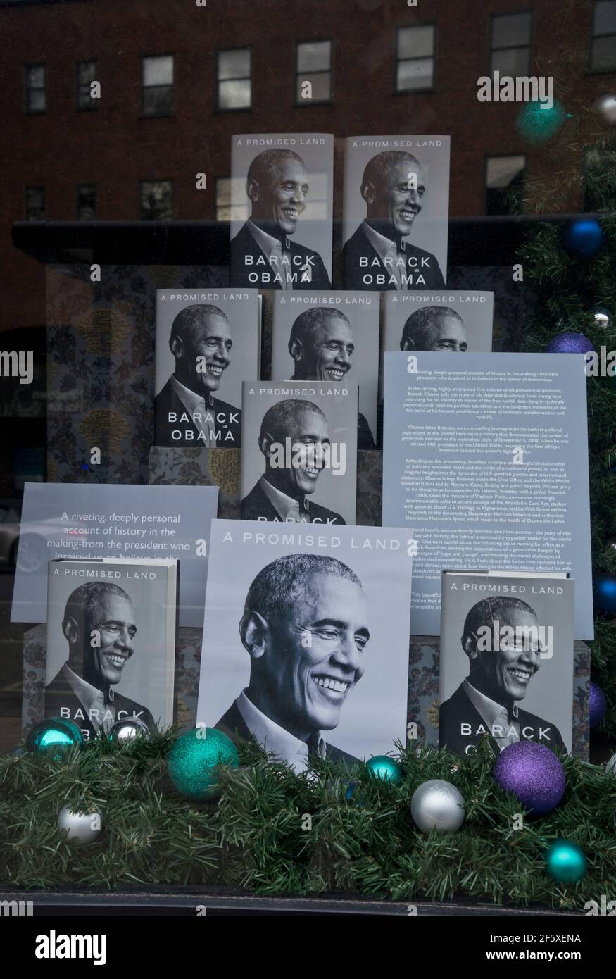 Barack Obama biography on display at a bookshop closed during lockdown ...