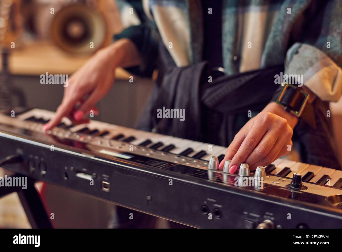 Playing a synthesizer hi-res stock photography and images - Alamy