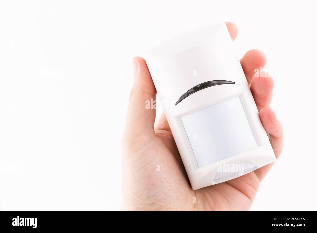 Male Hand is Holding Motion Sensor Isolated on White Background Stock ...