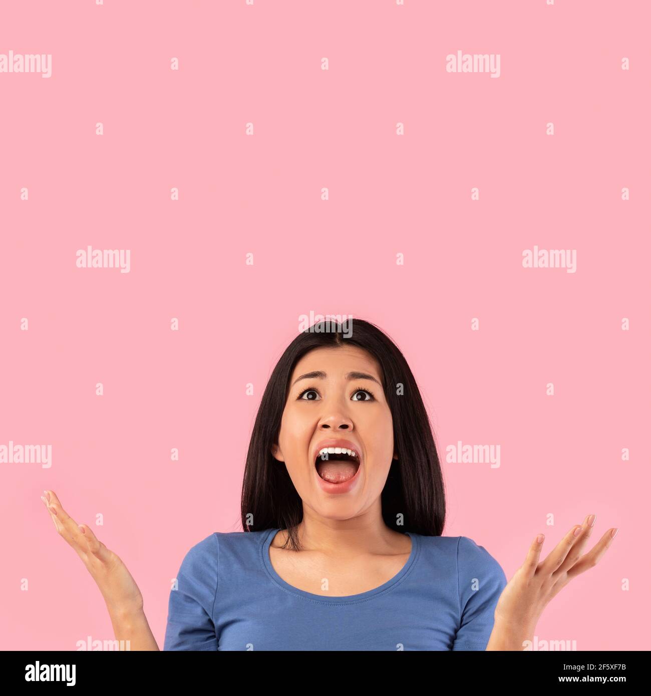 Shocked asian woman face looking hi-res stock photography and images ...