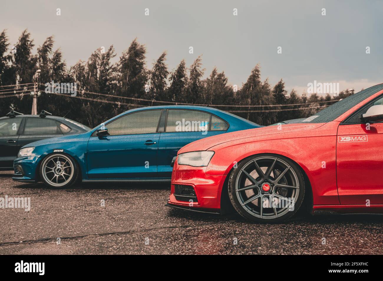 Moscow, Russia - July 6, 2019: Blue and red tuned Volkswagen and Audi ...