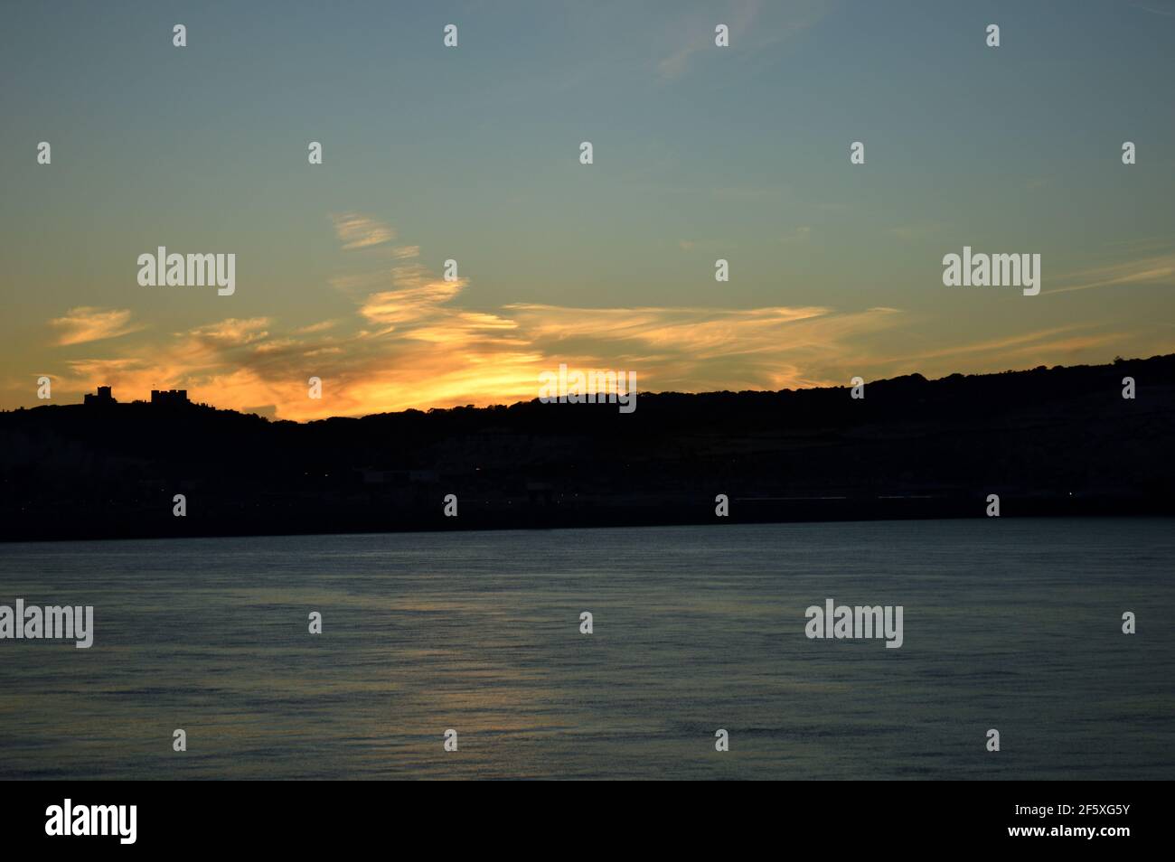 Channel crossing from Calais ferry terminal to dover and sunset over ...