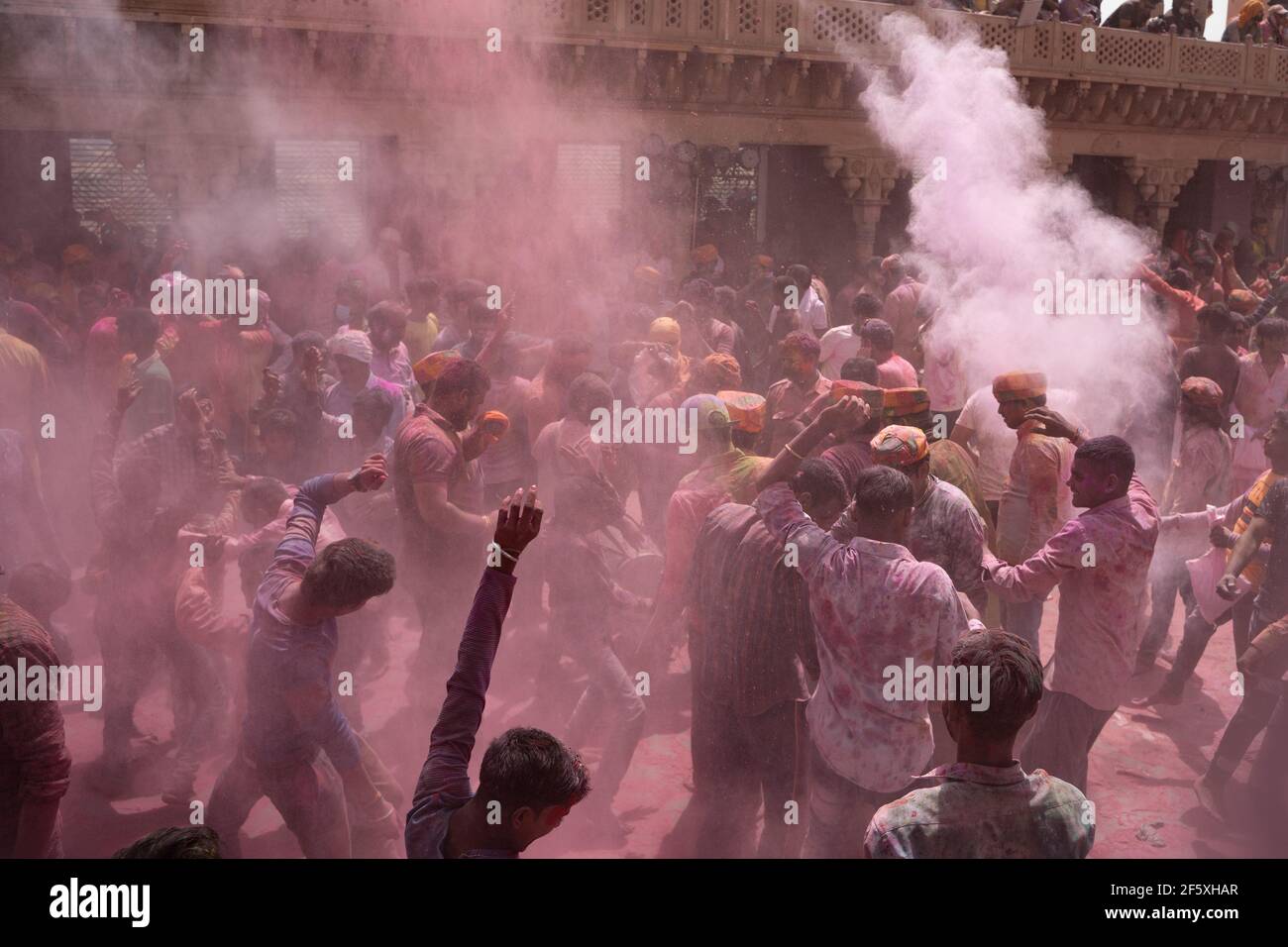 Krishna playing holi hi-res stock photography and images - Alamy