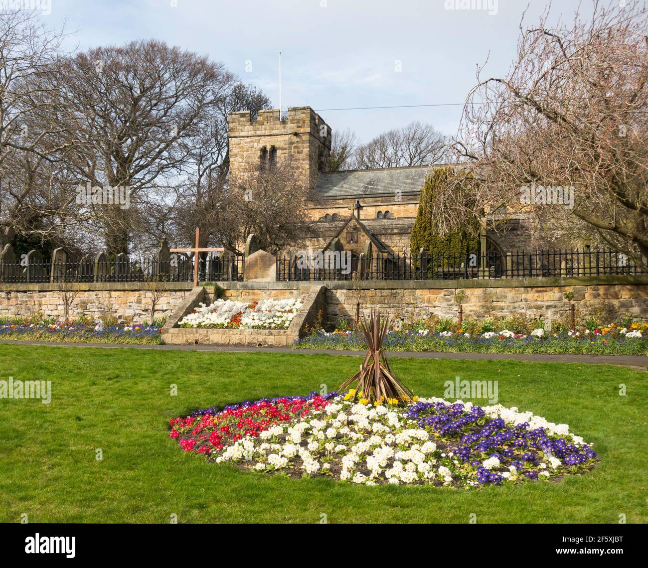 Spring flowers outside the church of St Mary the Virgin in Whickham ...