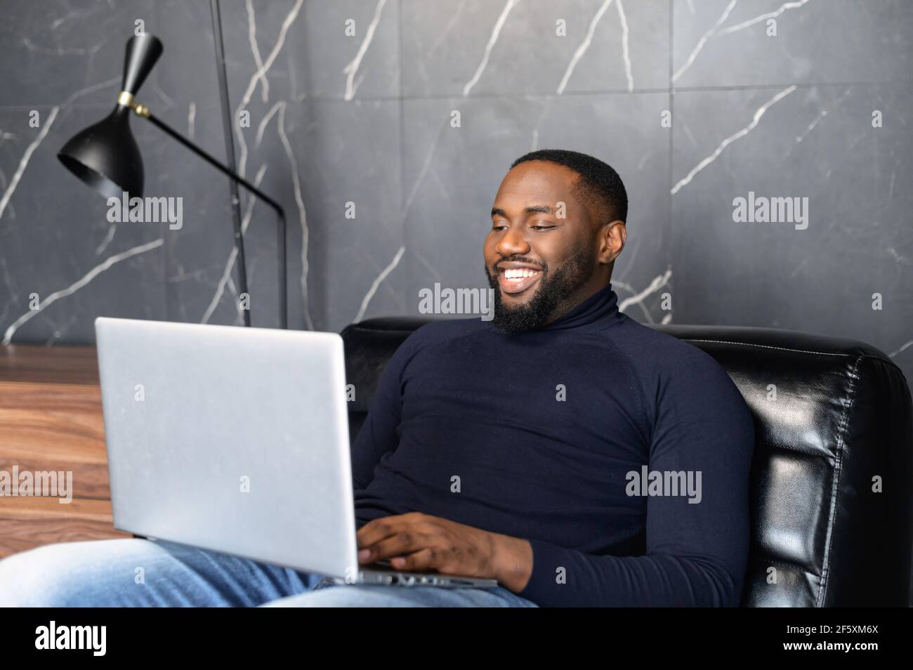 Black man reading hi-res stock photography and images - Alamy