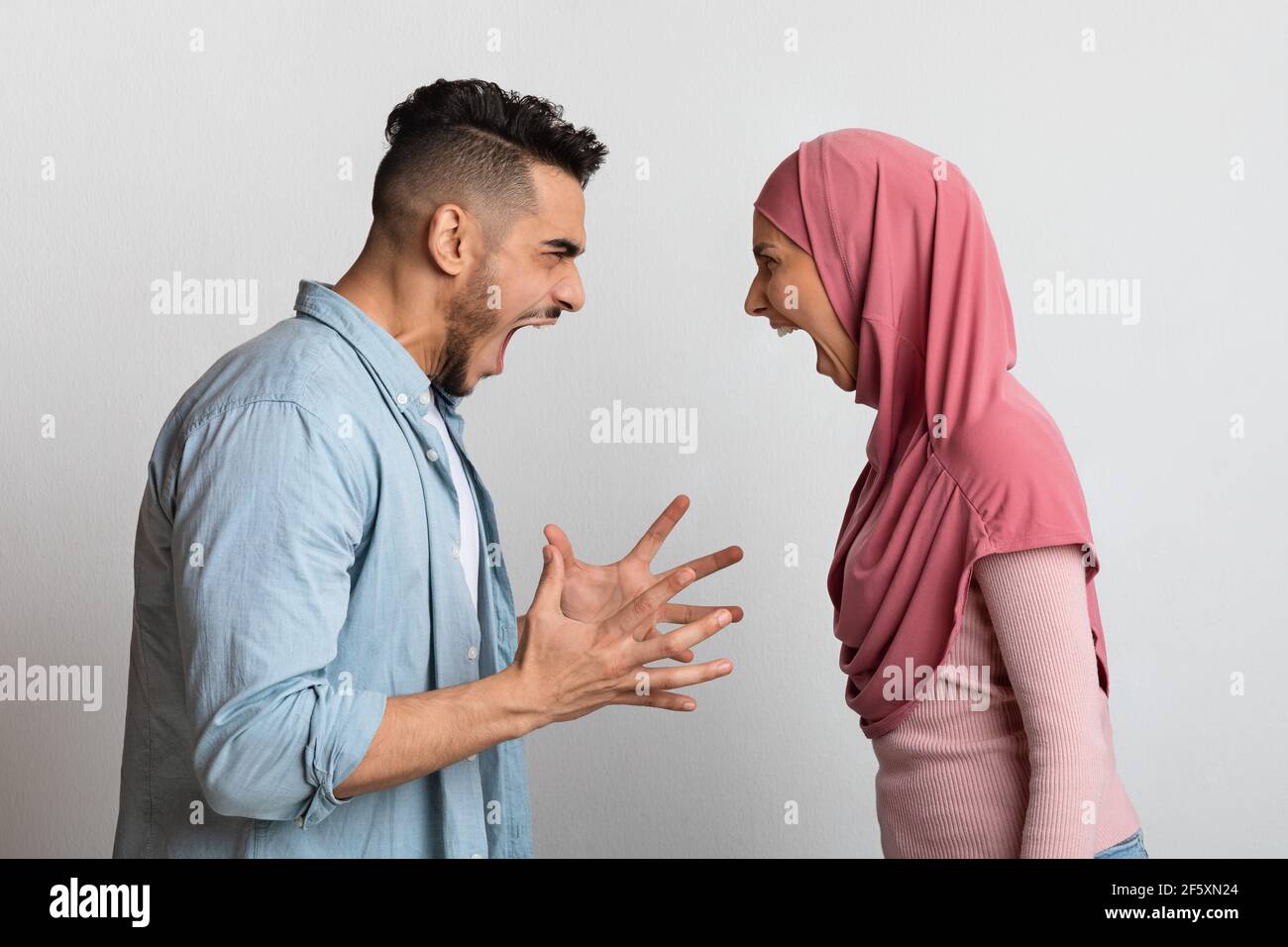 Couple Arguing. Furious Muslim Couple Shouting At Each Other, Having ...