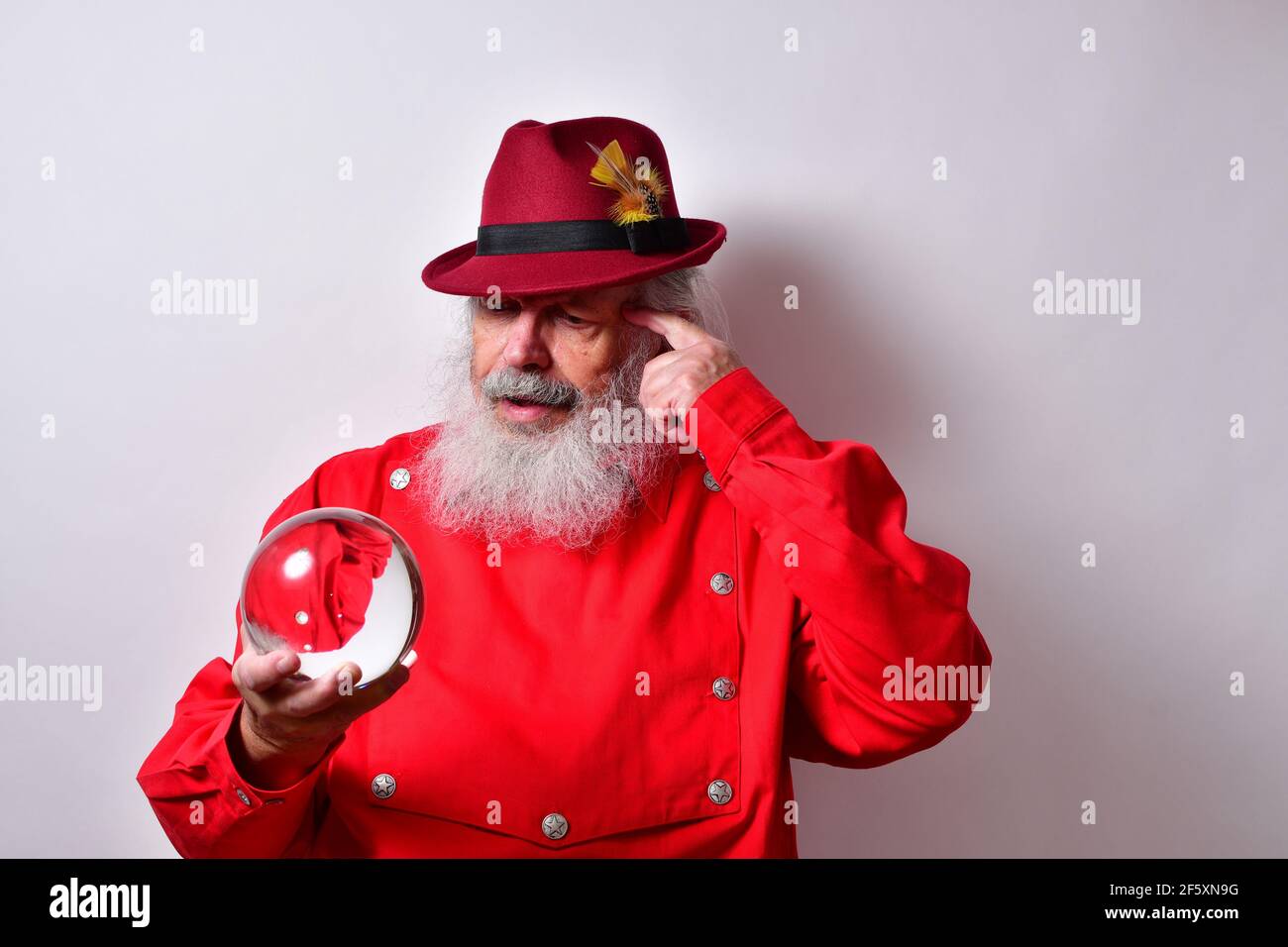 Old American male in a red bib shirt with a stylish fedora hat ...