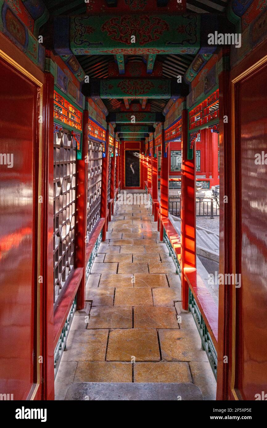 Ornamental covered walkway at the Forbidden City palaces in Beijing ...